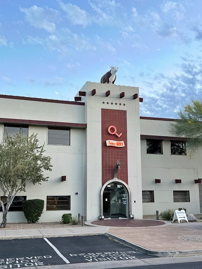 A steer on the roof? Now that's what I call high-steaks dining! The Stockyards' exterior promises a wild west adventure for your taste buds.
