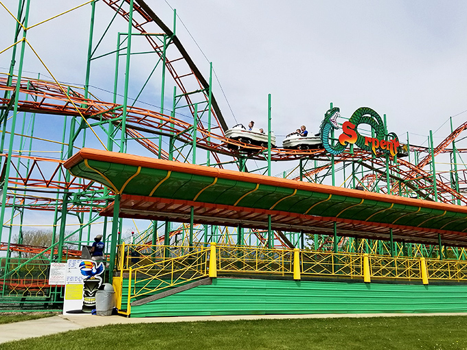 Buckle up, thrill-seekers! This roller coaster's twists and turns are more unpredictable than Michigan weather. Get ready for a wild ride that'll make your heart race faster than a squirrel spotting the last acorn of fall.