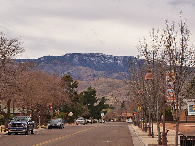 Postcard-perfect panorama or real life? Clarkdale's cityscape unfolds like a painter's dream, with mountains standing guard over charming rooftops. Bob Ross would be proud!