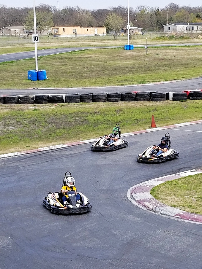Buckle up, speed demons! This aerial view of Dallas Karting Complex is like a racetrack buffet &ndash; all you can eat turns, with a side of adrenaline.