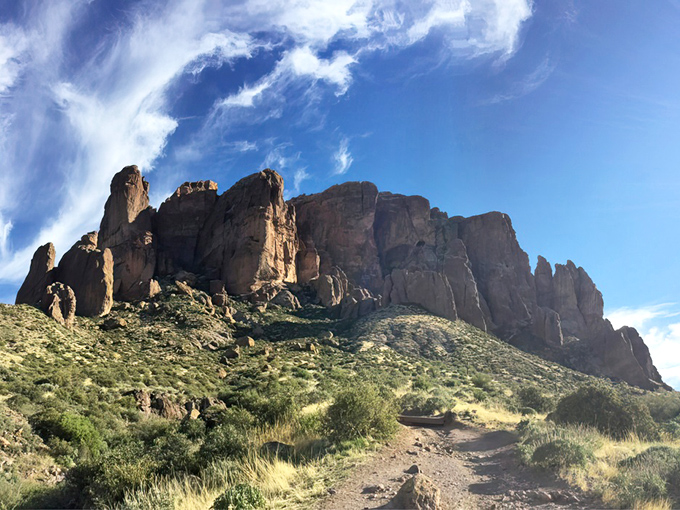 Nature's skyscraper! The Superstition Mountains rise like a majestic fortress, daring adventurers to uncover their secrets. Indiana Jones, eat your heart out!