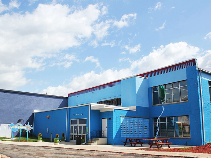 Blue-tiful science! This vibrant building isn't just eye-catching; it's a beacon of curiosity, promising 50 years of mind-sparking adventures inside.