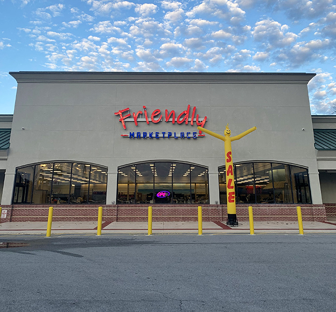 Welcome to bargain heaven! This cheerful yellow facade promises a treasure trove of deals inside, where your wallet can breathe a sigh of relief. 
