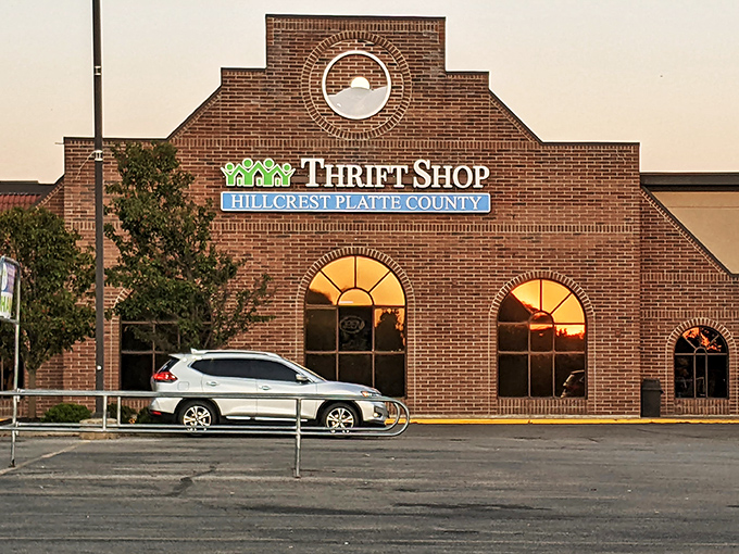 Welcome to bargain heaven! Hillcrest Thrift Shop's brick facade promises treasures within, like a modern-day Ali Baba's cave for the budget-conscious adventurer.