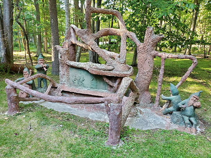 Welcome to Wonderland! This rustic sculpture invites you into a world where trees whisper secrets and concrete comes to life. Alice would feel right at home here.