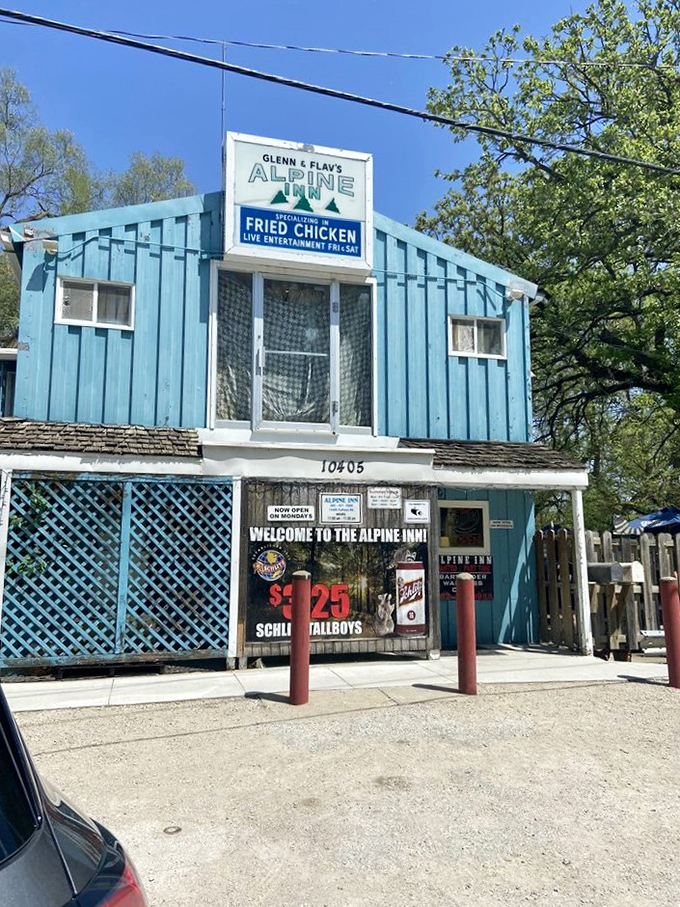 Welcome to the Alpine Inn, where the blue exterior is as inviting as a clear Nebraska sky. This humble abode houses fried chicken dreams!