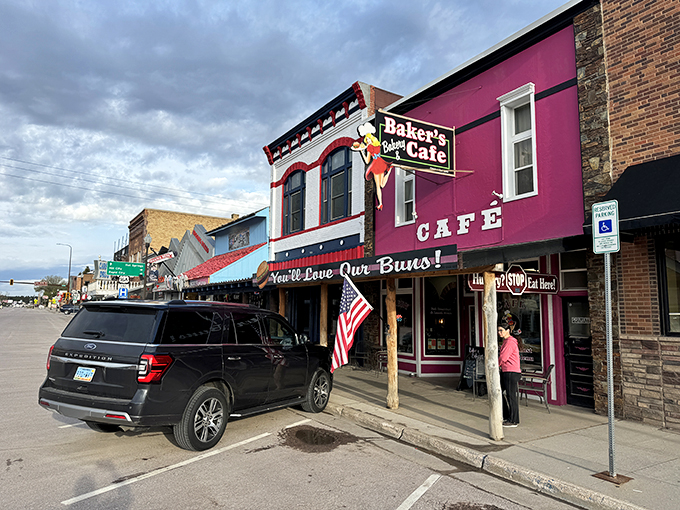 A pink paradise for pastry lovers! Baker's Bakery & Cafe stands out like a frosted cupcake on Custer's main street, promising sweet delights and savory treats for hungry travelers.