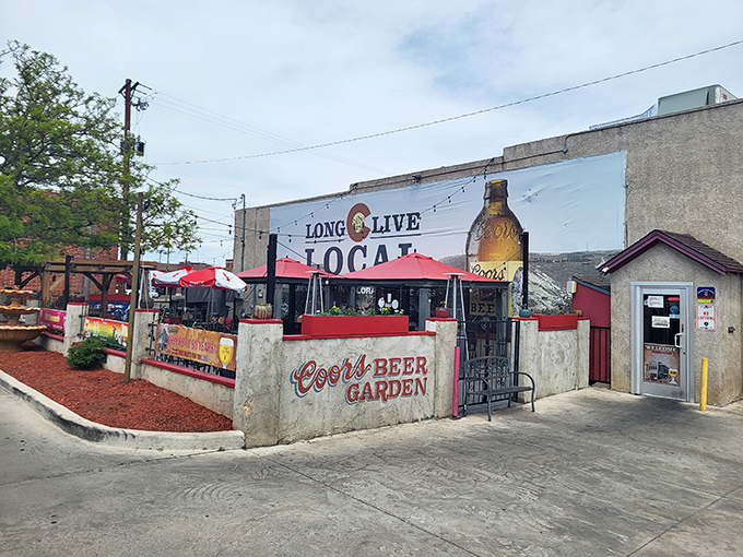 Welcome to flavor town! Gray's Coors Tavern's exterior promises a journey through time and taste, with its vintage charm and inviting beer garden.