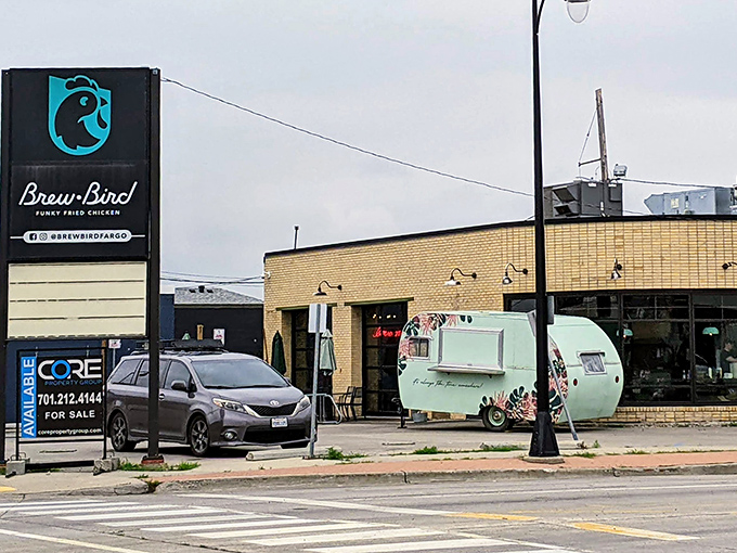 Brew Bird's curved brick exterior isn't just a wall&mdash;it's a warm hug welcoming you to flavor town. This unassuming facade hides a world of culinary delights waiting to be discovered.