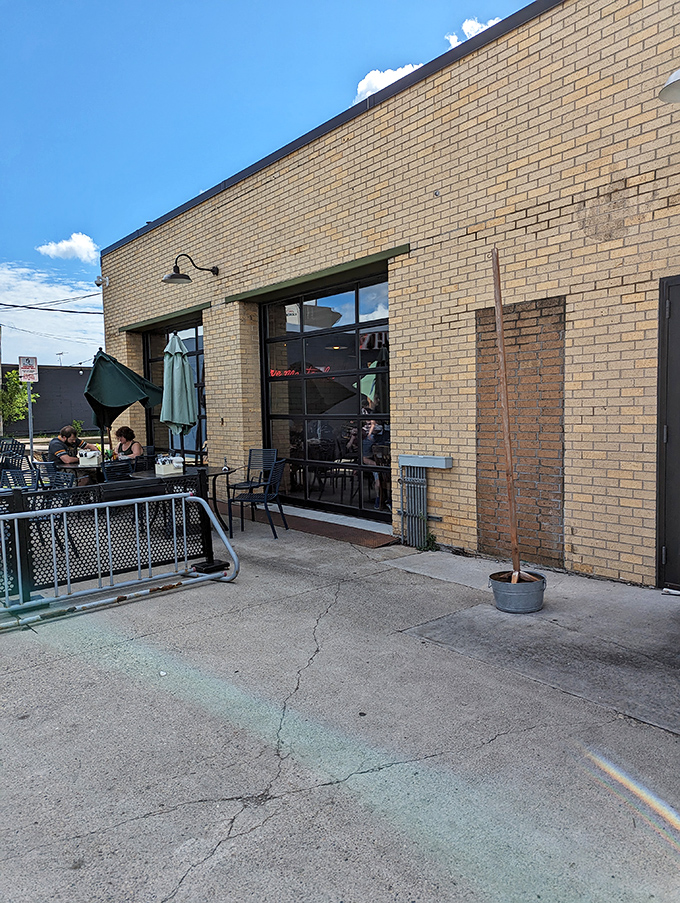 Brew Bird's curved brick exterior isn't just a wall&mdash;it's a warm hug welcoming you to flavor town. This unassuming facade hides a world of culinary delights waiting to be discovered.