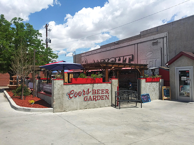 Welcome to flavor town! Gray's Coors Tavern's exterior promises a journey through time and taste, with its vintage charm and inviting beer garden.