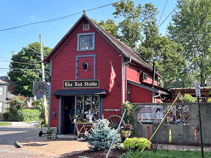 A barn-red beacon of whimsy! The Red Stable stands proud, its vibrant exterior promising a treasure trove of delights within. Step inside and let the adventure begin!