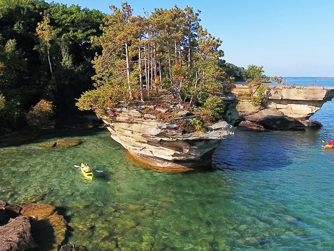 Nature's own Jenga tower! Turnip Rock stands defiantly against time and tide, a testament to Mother Earth's artistic flair.