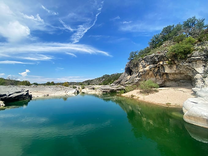 Nature's infinity pool! This turquoise oasis nestled among limestone cliffs is Mother Earth's answer to the resort experience.
