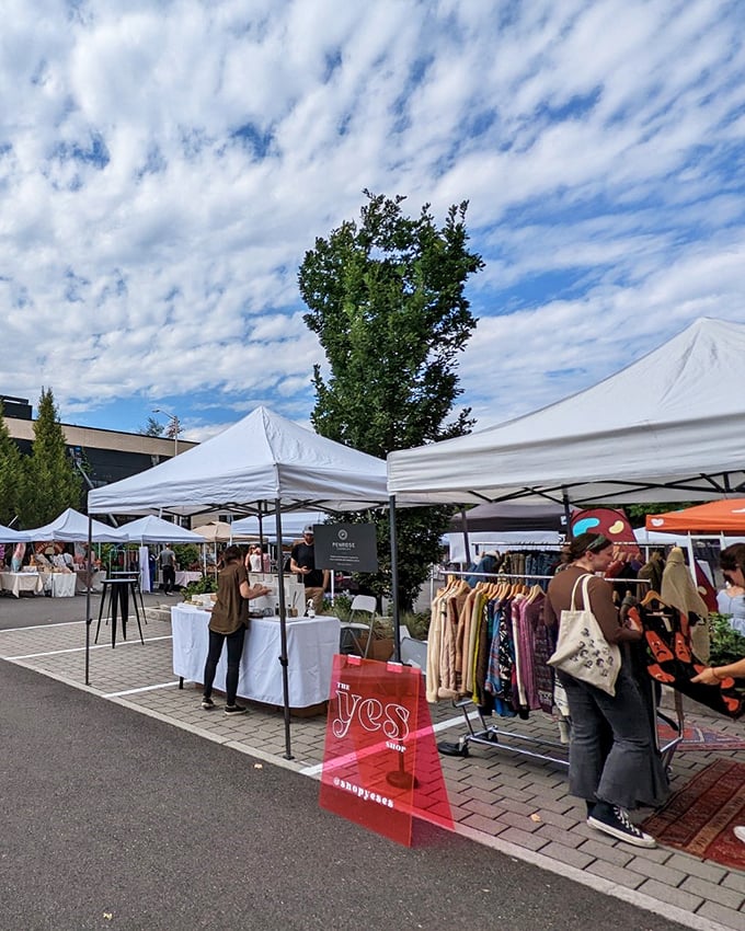 Welcome to Portland Flea, where vintage dreams come true! Colorful tents and eclectic crowds create a treasure hunter's paradise under the iconic Portland sky.
