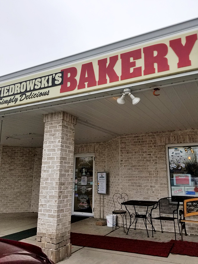 "Simply Delicious" indeed! This charming brick facade promises a sugar-coated adventure that'll make your taste buds do a happy dance.