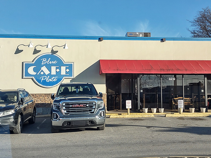 A blue-trimmed beacon of breakfast bliss! This unassuming exterior hides a treasure trove of Southern comfort food that'll make your taste buds dance.