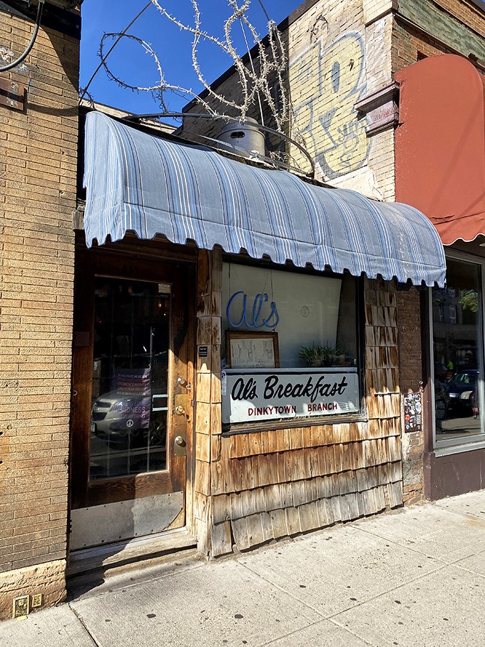 Welcome to Al's Breakfast, where the awning is as blue as the Minnesota sky and the promise of pancakes is just as vast!