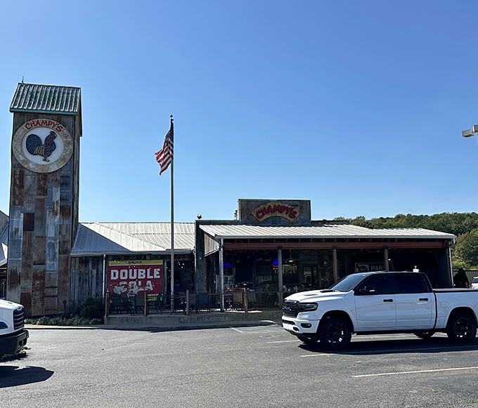 Rustic charm meets Southern hospitality! Champy's exterior beckons with its weathered wood, twinkling lights, and promise of finger-lickin' goodness inside.