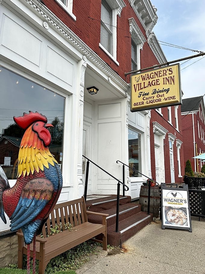Step into a time warp! This red brick beauty, complete with a technicolor rooster, is like Norman Rockwell's dream come to life.