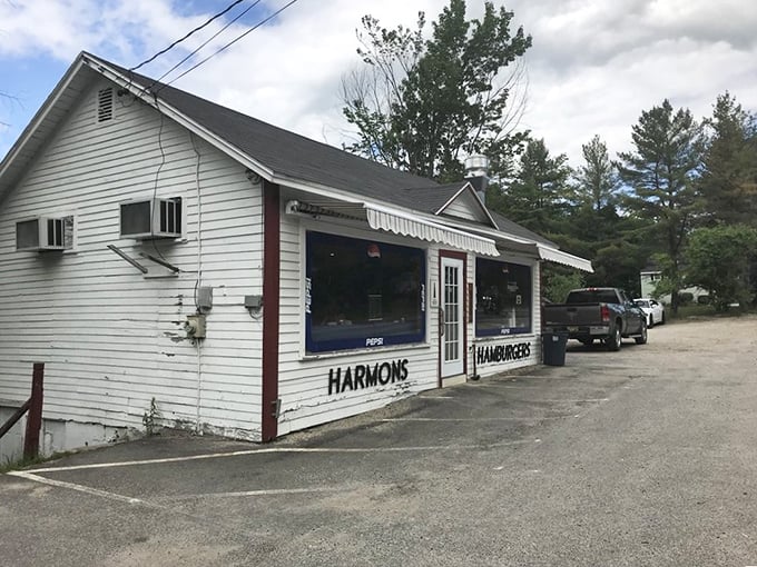 A time capsule with a side of fries! Harmon's Lunch stands proudly, its white clapboard exterior whispering tales of burgers past and onion rings to come.