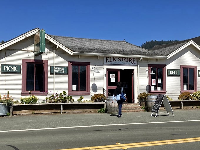 Welcome to the Elk Store, where Norman Rockwell meets gourmet sandwiches. This charming white building with its red door is like a beacon of deliciousness in the California countryside.
