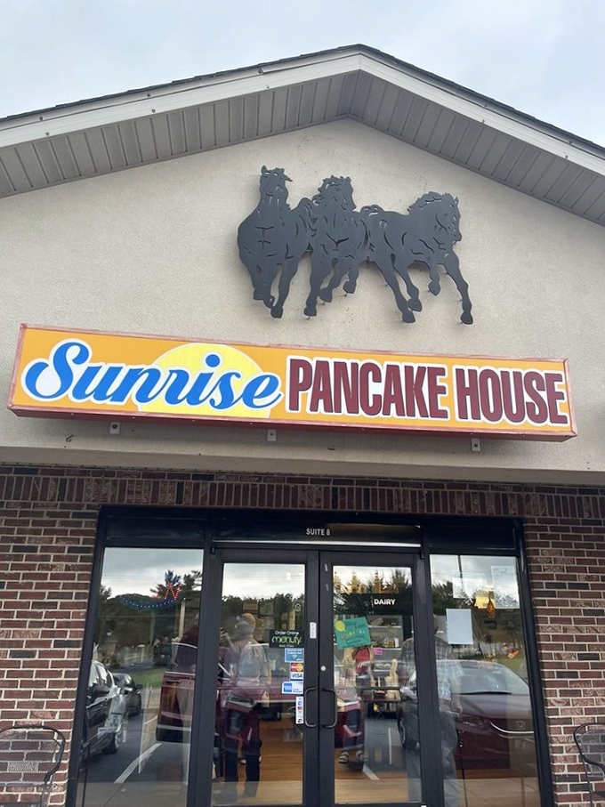 Giddy up, breakfast lovers! Sunrise Pancake House's exterior promises a feast fit for champions, with galloping horses leading the charge to deliciousness.