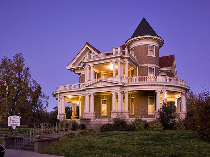 A Victorian dream come to life! Wall Manor stands proudly, its turret reaching for the sky like a fairytale castle transplanted to the Illinois prairie.