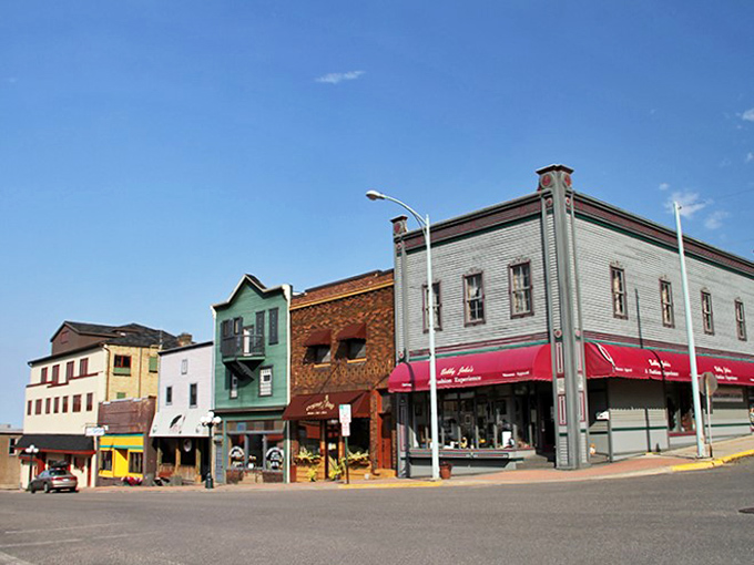 Welcome to Ely, where the streets are as friendly as the locals! This charming town view could be a postcard, but it's just another day in Minnesota's northwoods paradise.