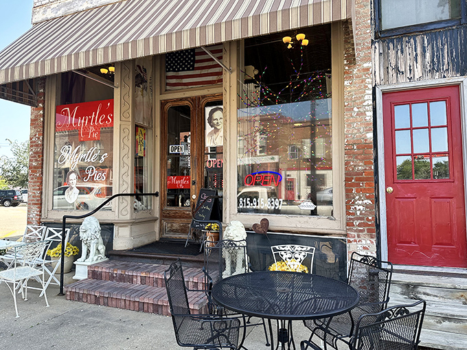 Step into a slice of Americana! Myrtle's Pie Shop beckons with its charming storefront, promising sweet delights and a hefty dose of nostalgia.