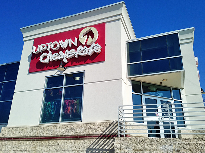 Welcome to fashion paradise! Uptown Cheapskate's bold red sign beckons bargain hunters like a siren call to stylish sailors.