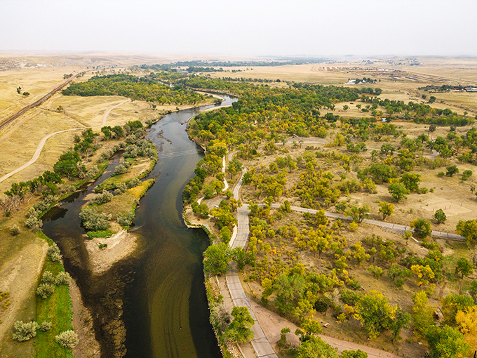 This aerial view of Edness Kimball Wilkins State Park looks like Mother Nature's own jigsaw puzzle. Green patches, winding paths, and that serpentine river &ndash; it's Wyoming's version of a Picasso masterpiece!