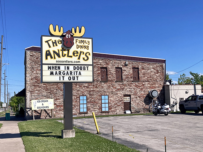 "When in doubt, margarita it out!" This stone fortress of flavor beckons with a sign that's part wisdom, part invitation. Who knew antlers could be so welcoming?