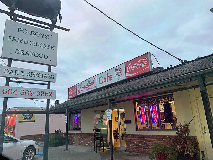 A neon-lit beacon of comfort food! Fiorella's Cafe stands ready to welcome hungry souls with its promise of po-boys, fried chicken, and Southern hospitality.