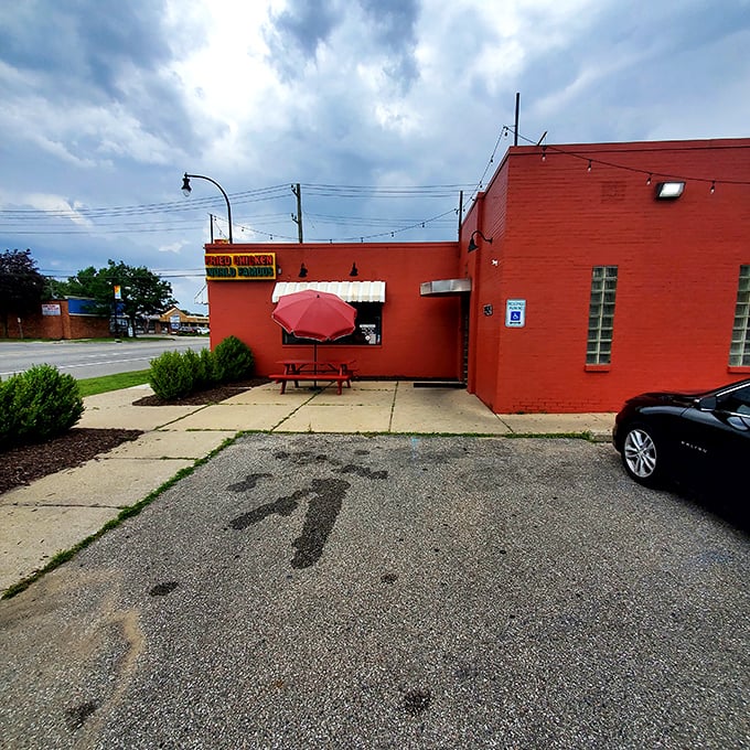 A red-brick beacon of flavor! Gus's exterior promises a no-frills experience that's all about the chicken. It's like the Fort Knox of fried poultry &ndash; plain outside, but pure gold within.