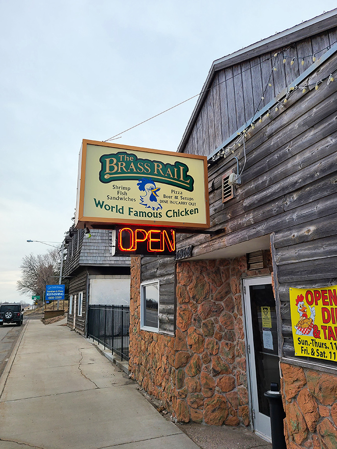 Rustic charm meets culinary legend! The Brass Rail's exterior promises a feast for both the eyes and the taste buds.