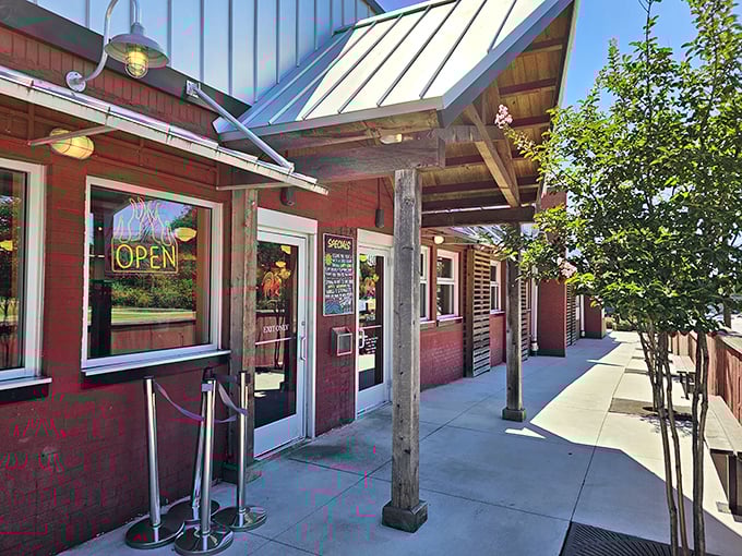A fiery rooster guards the entrance, promising a clucking good time. Rocky's Hot Chicken Shack's exterior is as inviting as a Southern front porch on a summer evening.