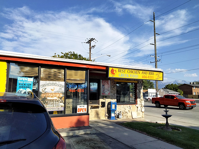 Sunshine on a plate! This vibrant yellow building with its bold red door is like a beacon for hungry souls in Salt Lake City.