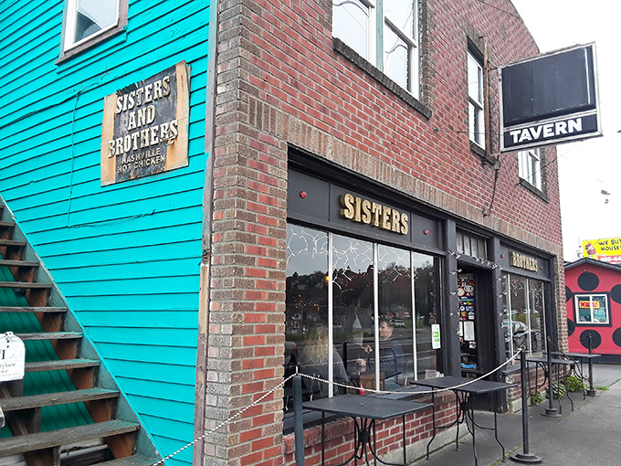 Teal meets brick in this culinary hideaway. Sisters and Brothers stands out like a peacock at a pigeon convention, promising Nashville heat in the heart of Seattle.