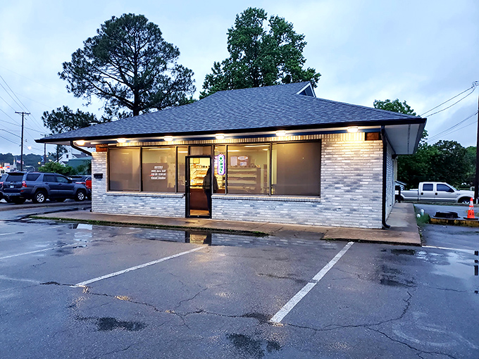A humble brick facade hides a world of sugary wonders. Mark's Do-Nut Shop: where dreams come glazed, frosted, and filled.