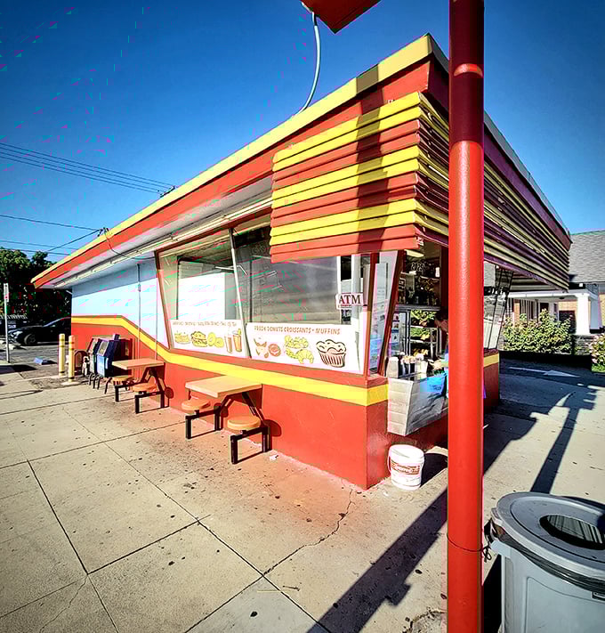 A retro rainbow in the heart of Burbank! Donut Hut's exterior is like a time machine, whisking you back to simpler, sweeter days.