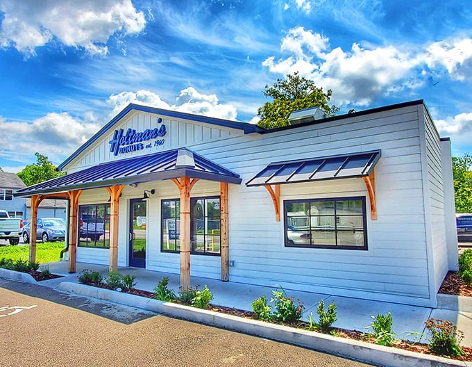 A slice of donut heaven on Earth! Holtman's charming exterior promises sweet delights within, like a modern-day Willy Wonka's factory for the circular confection connoisseur.