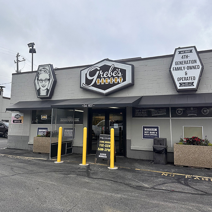 Welcome to carb heaven! Grebe's Bakery's retro sign beckons like a sugary siren, promising delights that would make even the Pillsbury Doughboy jealous.