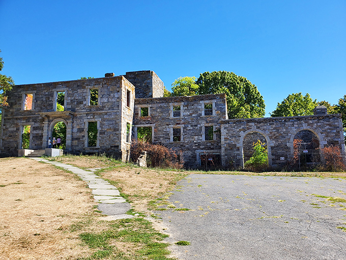 Stone sentinels stand guard, their empty windows framing nature's masterpieces. Goddard Mansion whispers tales of bygone elegance, inviting curious souls to step into history's embrace.