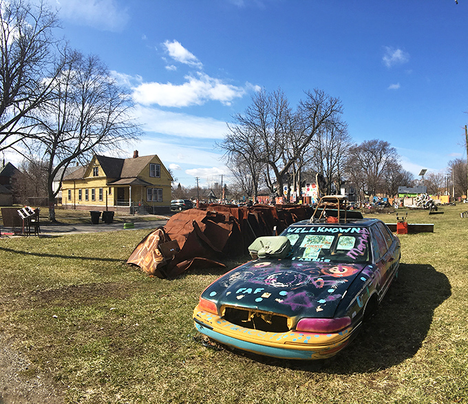 Welcome to the Heidelberg Project, where everyday objects become extraordinary art! This colorful car looks ready for a psychedelic road trip through imagination.