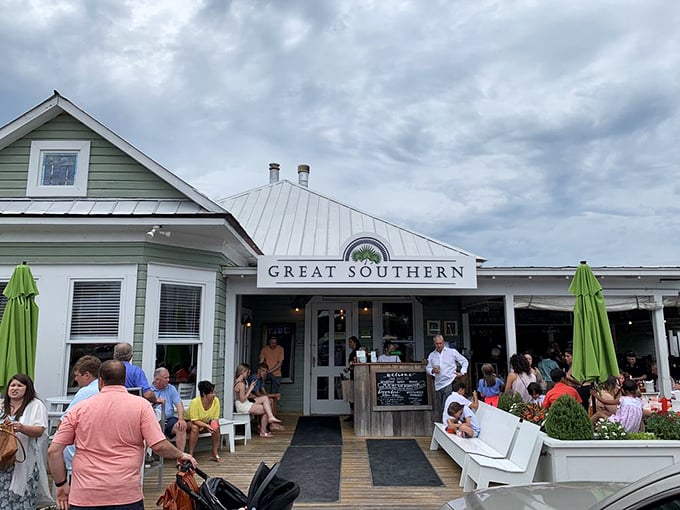 Welcome to flavor paradise! The Great Southern Cafe's charming exterior promises a feast for the senses, with those lime-green umbrellas practically winking at you to come on in.