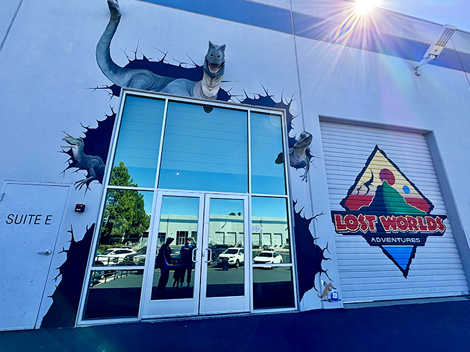 "Welcome to Jurassic Park&hellip; er, Lost Worlds Adventures!" This eye-catching entrance sets the stage for prehistoric thrills, with a dino bursting through the wall like an overeager party crasher.