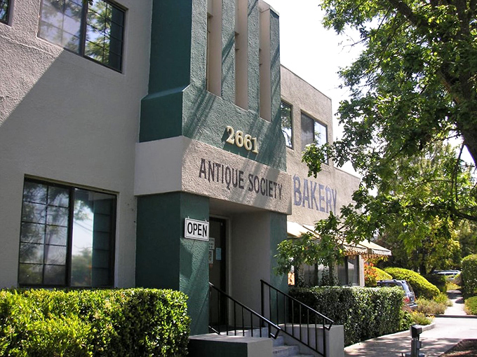 Welcome to Antique Society, where the past comes alive! This unassuming exterior houses a treasure trove of memories waiting to be rediscovered.