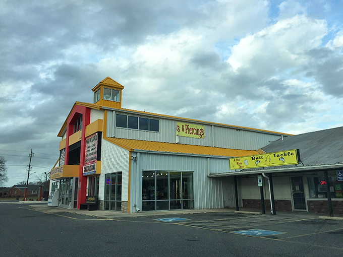 Welcome to bargain hunter's paradise! Laurel Junction Flea Market's colorful exterior promises a treasure trove of finds inside. It's like Aladdin's cave, but with better parking.