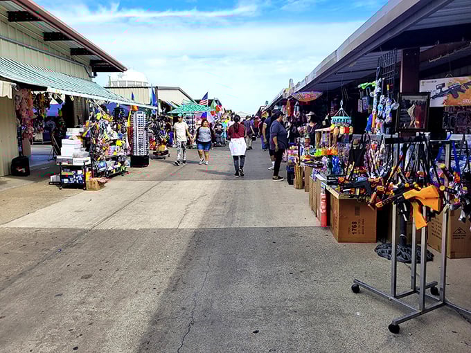 Welcome to bargain hunter's paradise! Traders Village's iconic green and yellow entrance beckons shoppers to a world of treasures and treats.